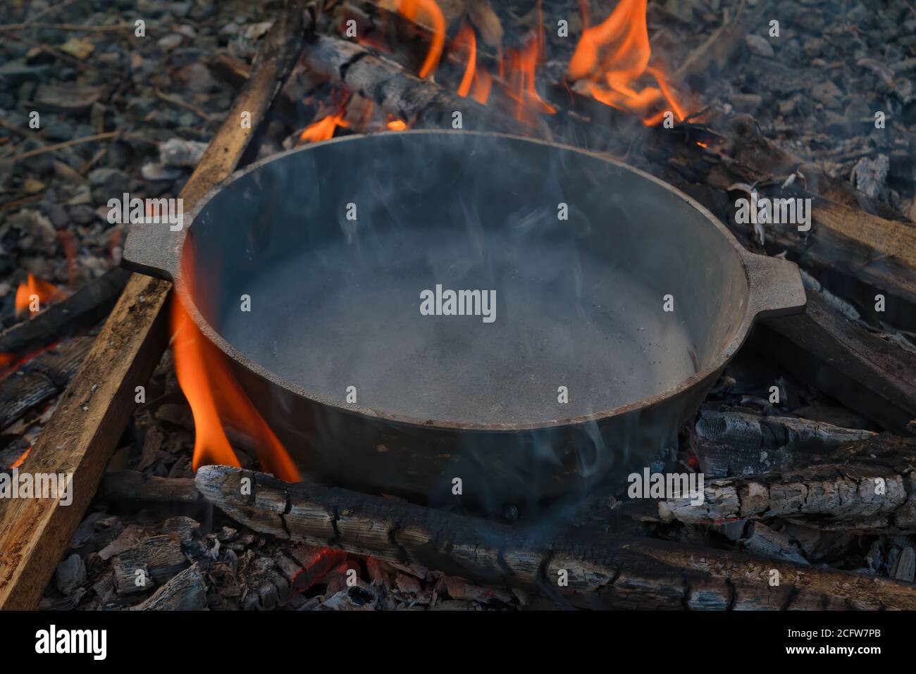Black man cooking on a barbecue hi-res stock photography and images - Alamy