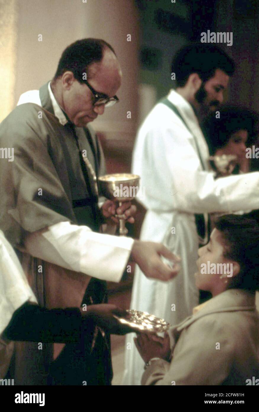 Receive holy communion hi-res stock photography and images - Alamy
