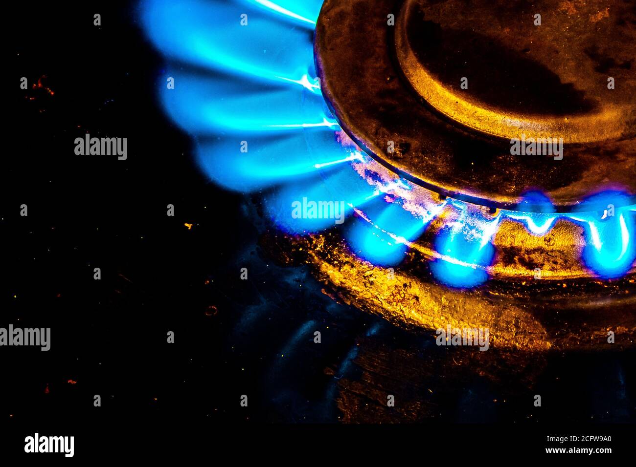 Abstract close up of ignited gas stove burner Stock Photo - Alamy