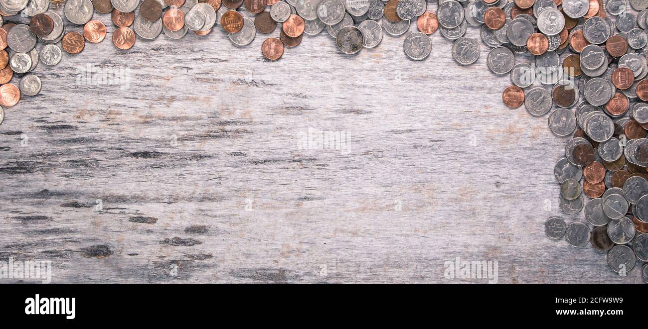 Old wood background with old coins scattered to form frame. Texture ...