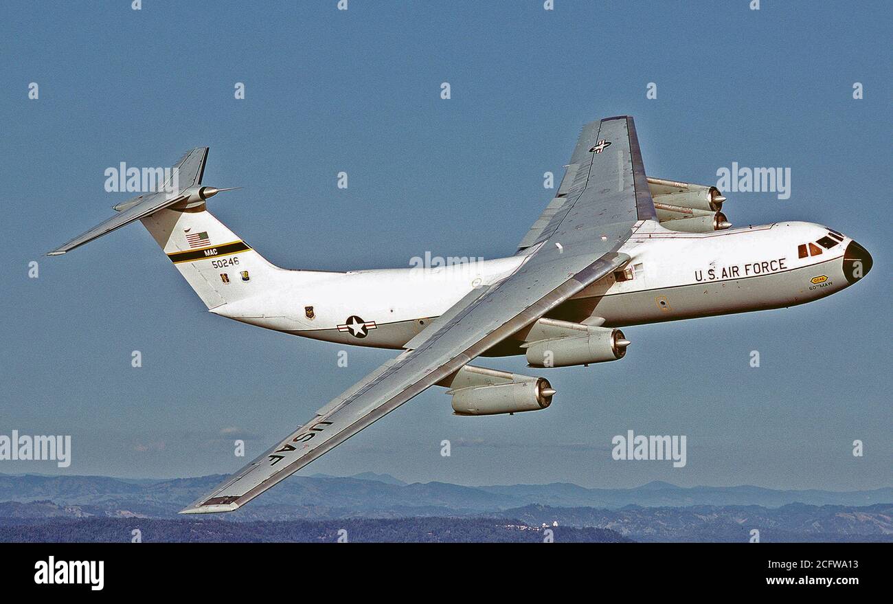 1979 - An air-to-air right side view of a C-141 Starlifter aircraft ...