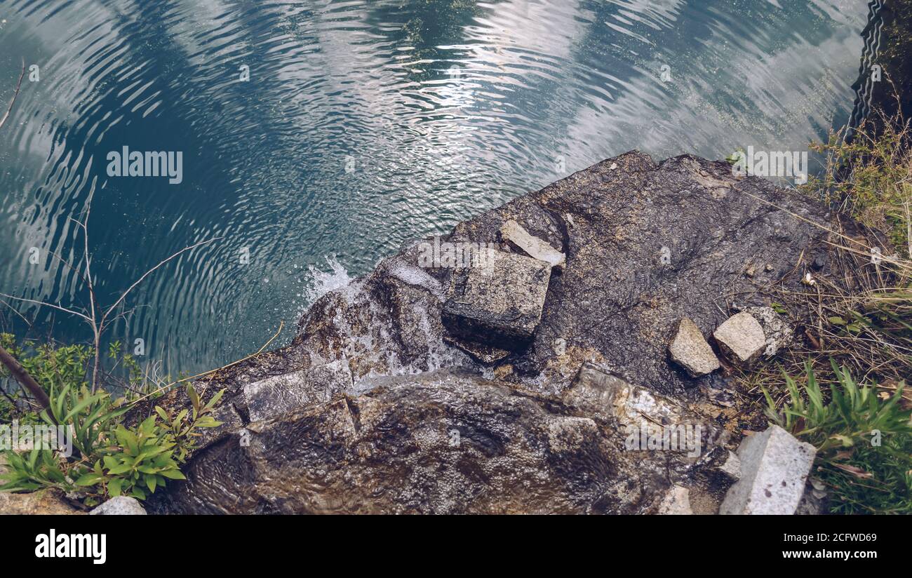 Spring water falling from rock hi-res stock photography and images - Alamy