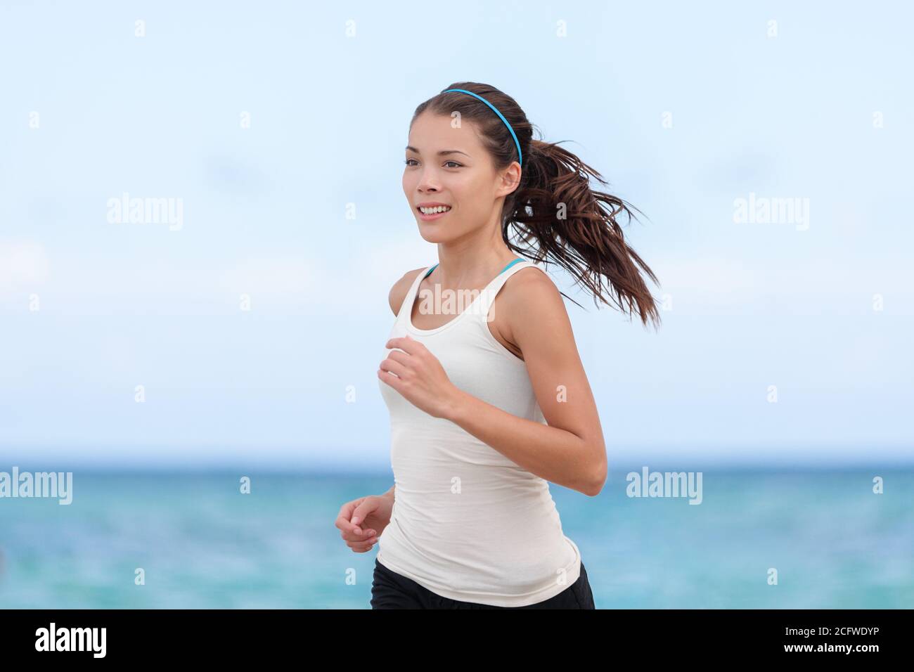 Fit sport athlete running woman runner jogging on outdoor workout on ...