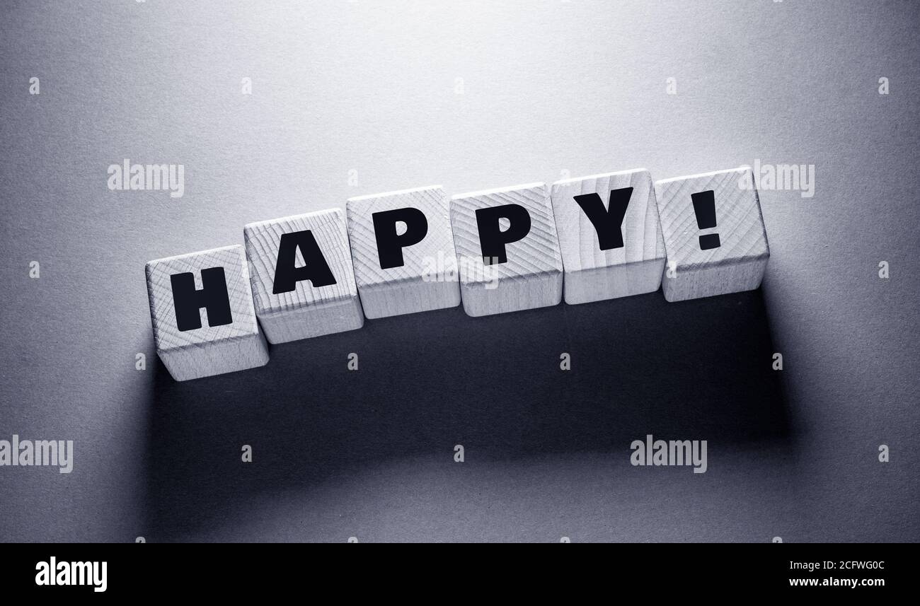 Happy Word Written on Wooden Cubes Stock Photo - Alamy
