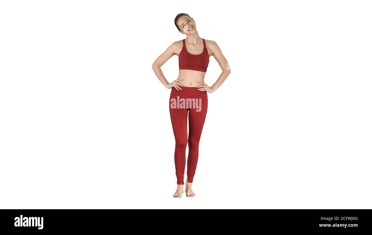 Mature Woman Stretching Her Neck And Walking On White Background Stock