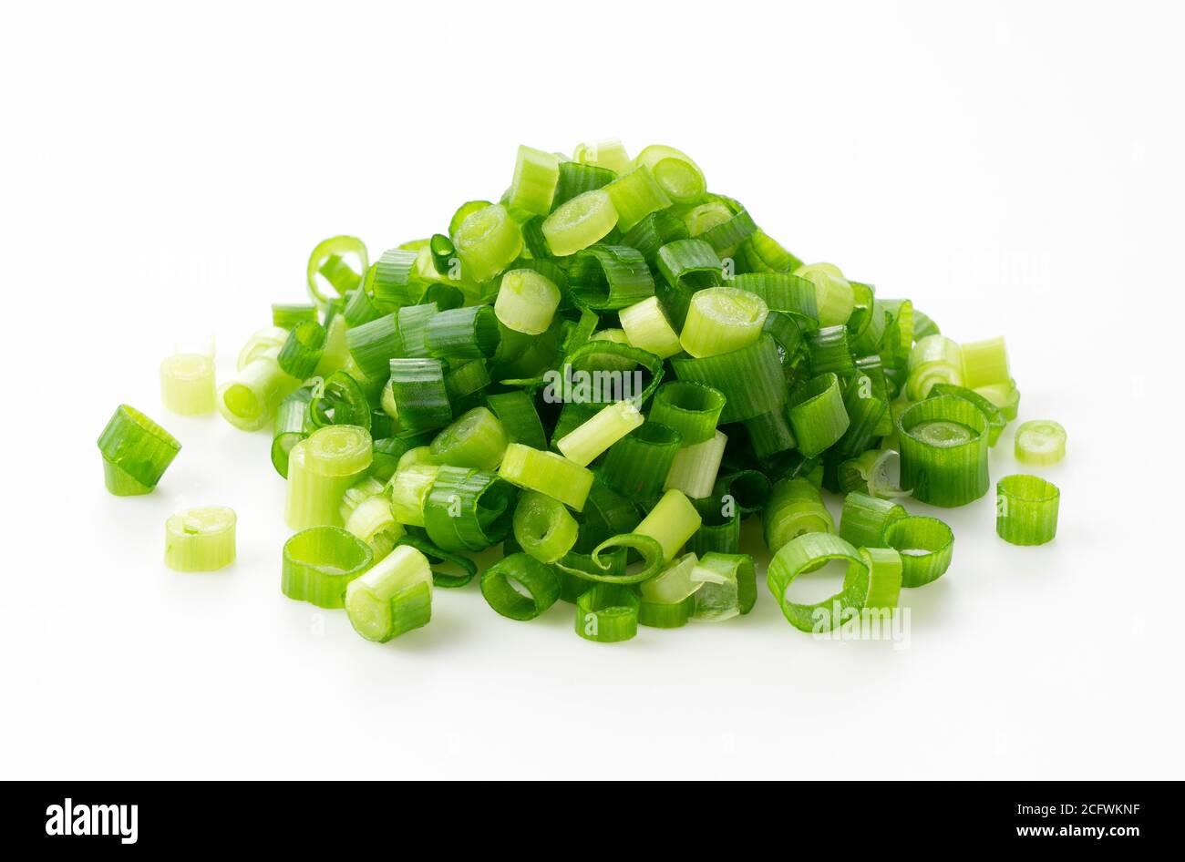 Chopped green onions placed on a white background were photographed ...