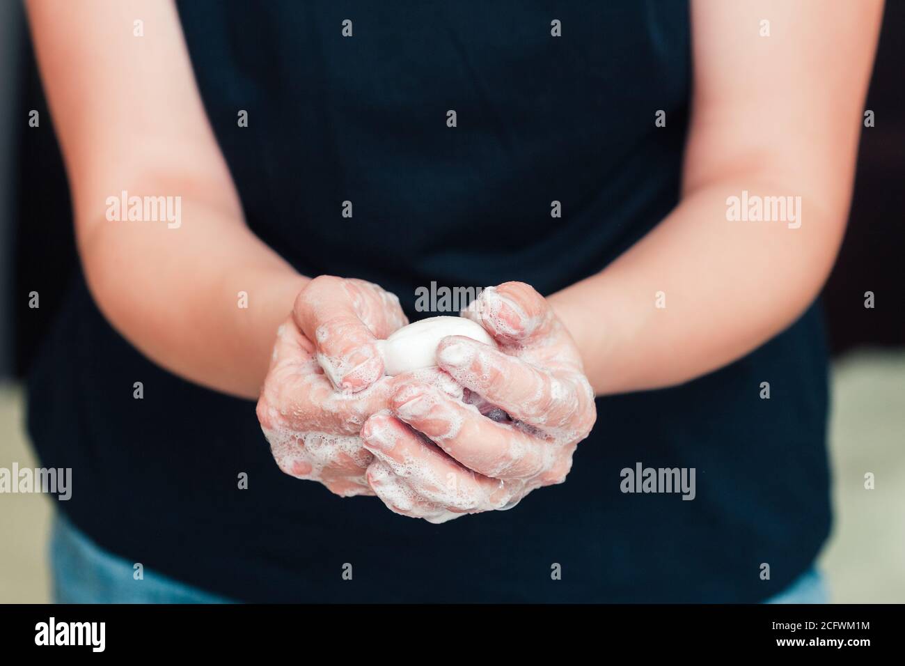 Front view on womans hands with white soap and foam, personal hygiene ...