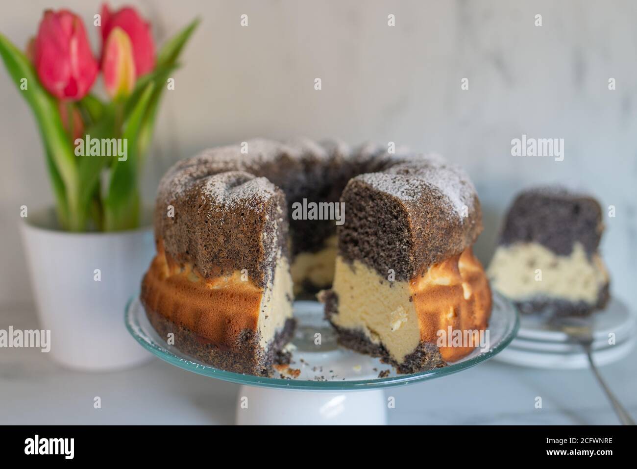 home made poppy seed sponge cake on a table Stock Photo - Alamy