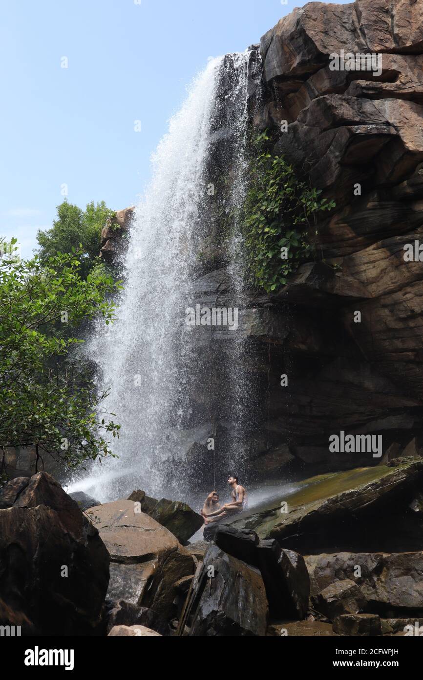 Cliff of a waterfall with selective focus. Landscape view of a flowing ...