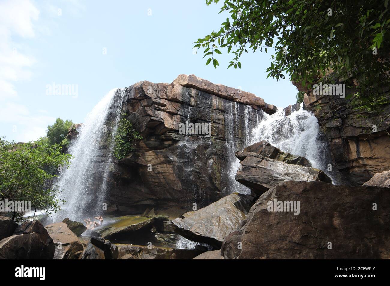 Cliff of a waterfall with selective focus. Landscape view of a flowing ...