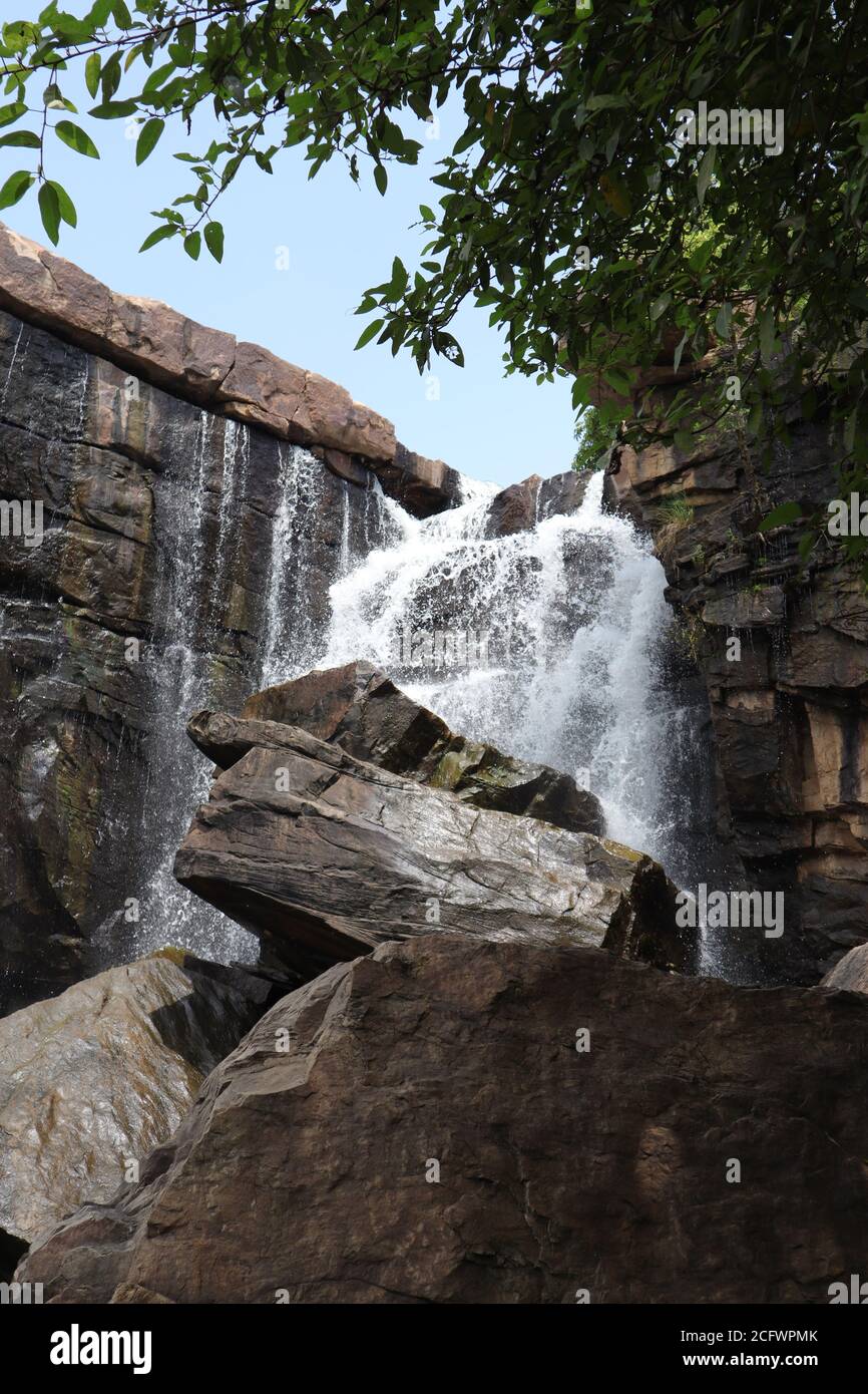 Cliff of a waterfall with selective focus. Landscape view of a flowing ...