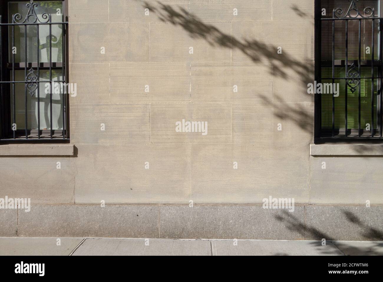 outdoor body of an urban building with windows and sidewalk Stock Photo ...