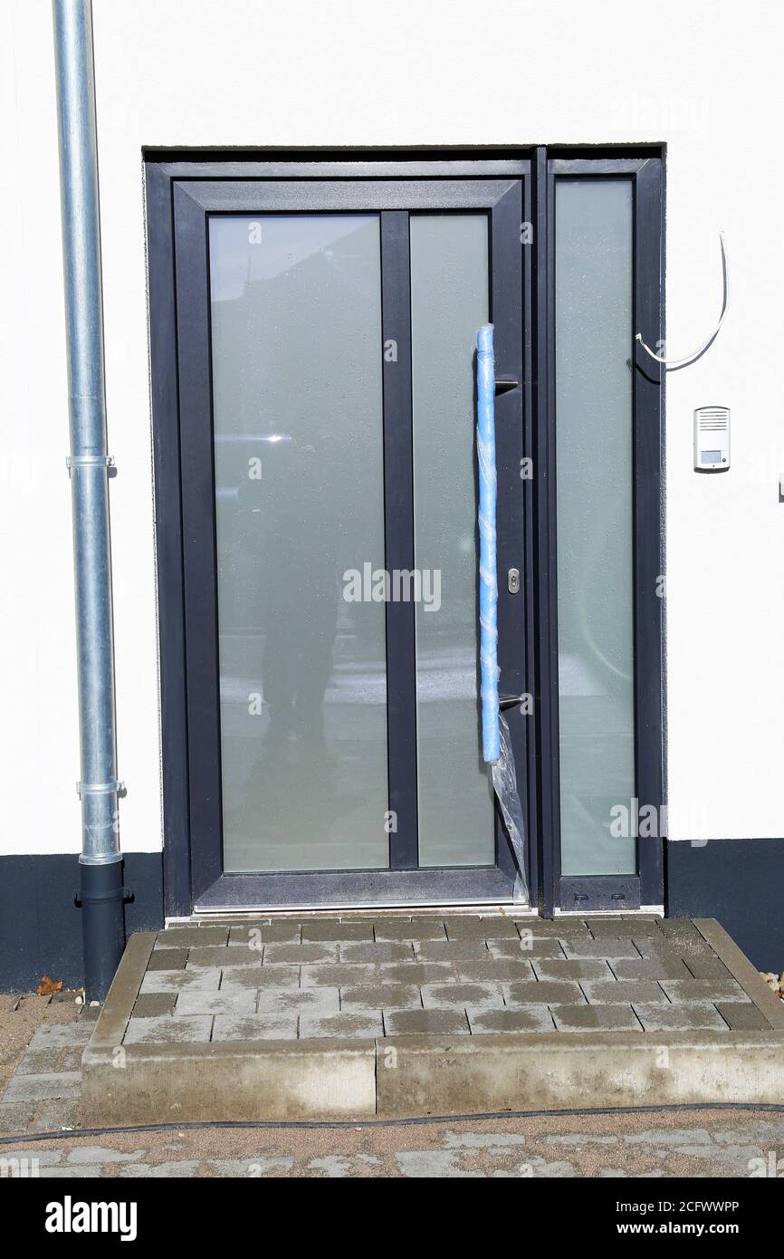 Modern front door Stock Photo - Alamy