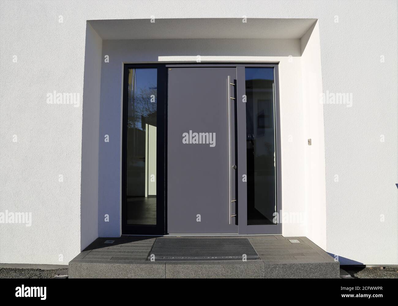 Modern front door Stock Photo - Alamy