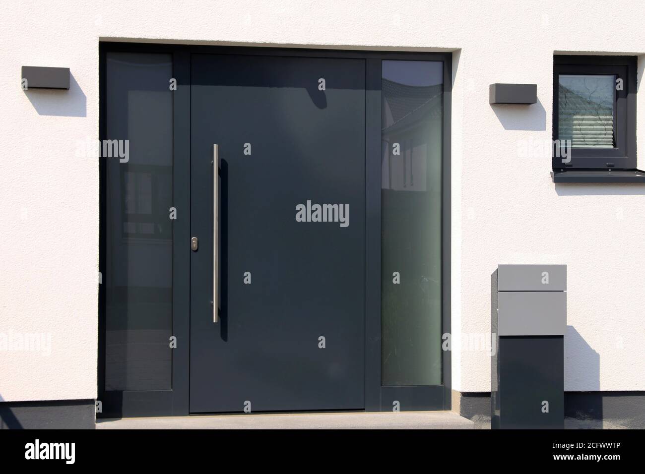 Modern front door Stock Photo - Alamy