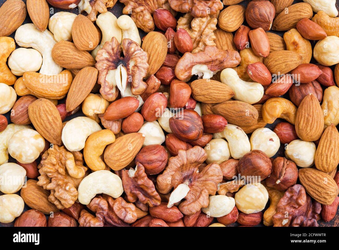 Top view of tasty mix nuts background. Concept healthy snack Stock ...