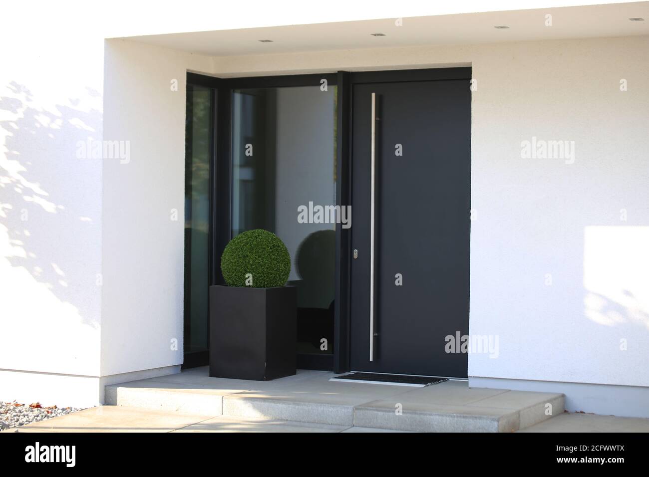 Modern front door Stock Photo - Alamy