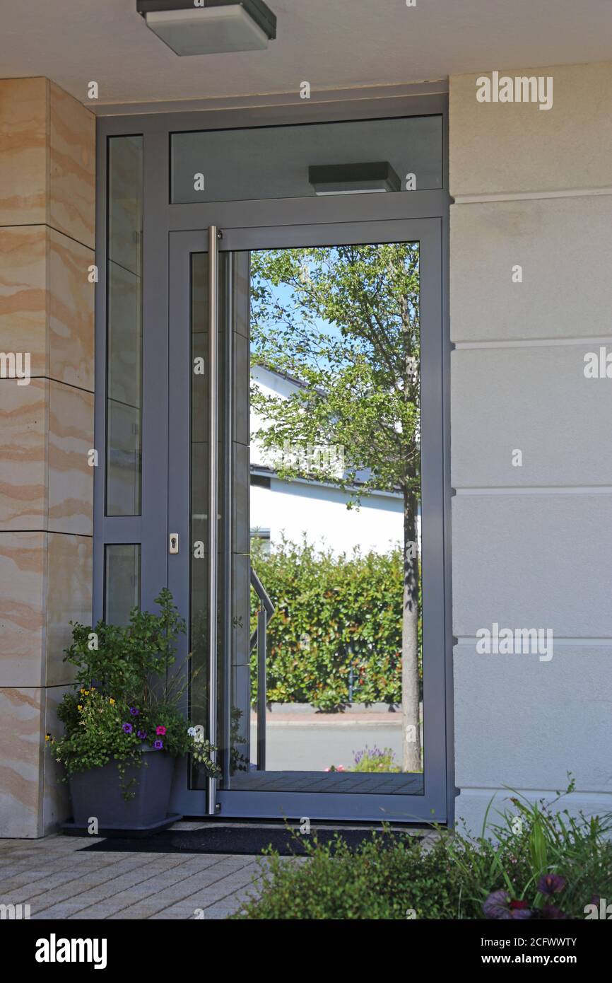 Modern front door Stock Photo - Alamy