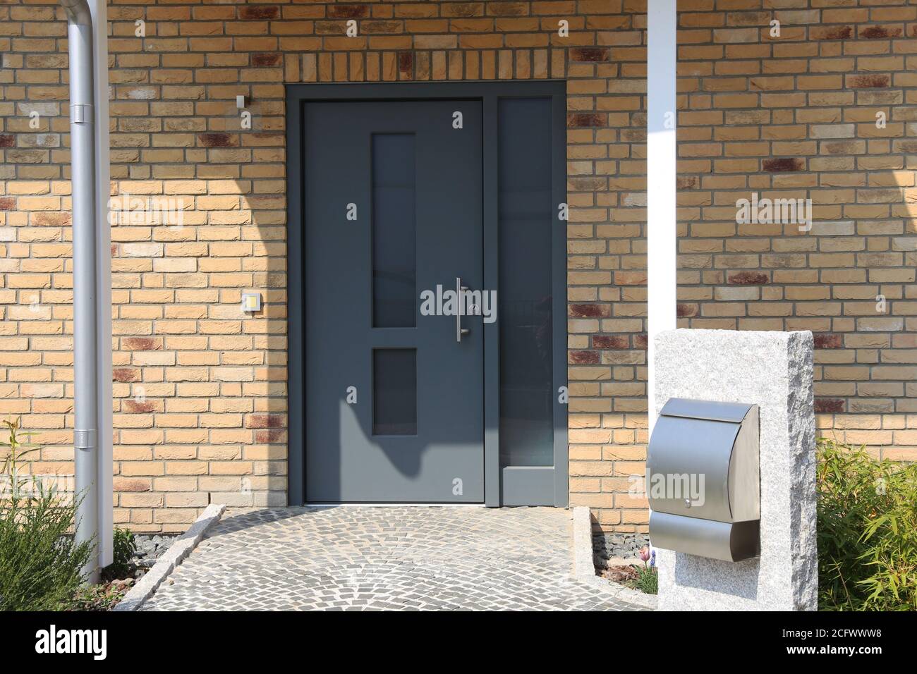 Modern front door Stock Photo - Alamy