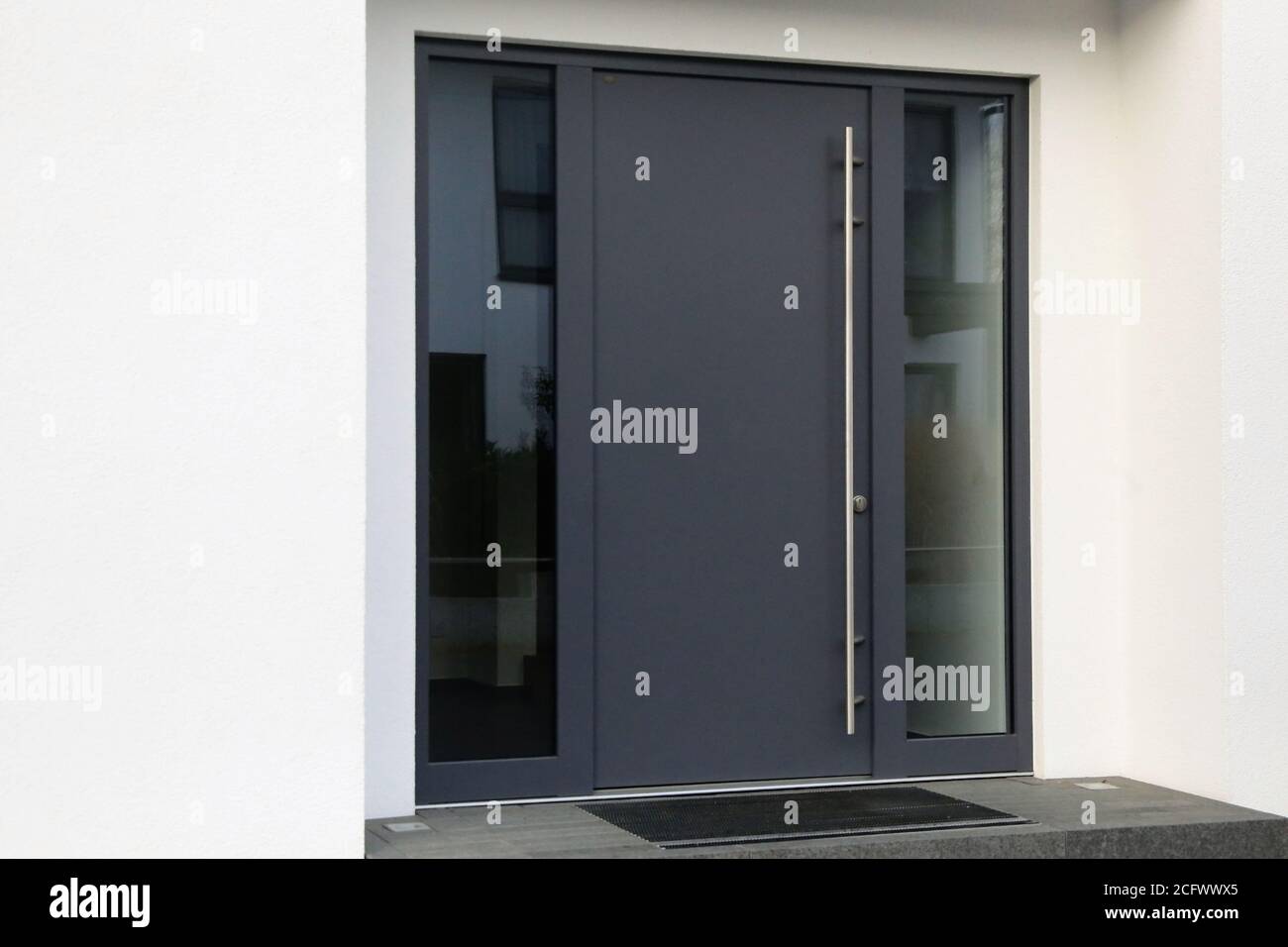 Modern front door Stock Photo - Alamy