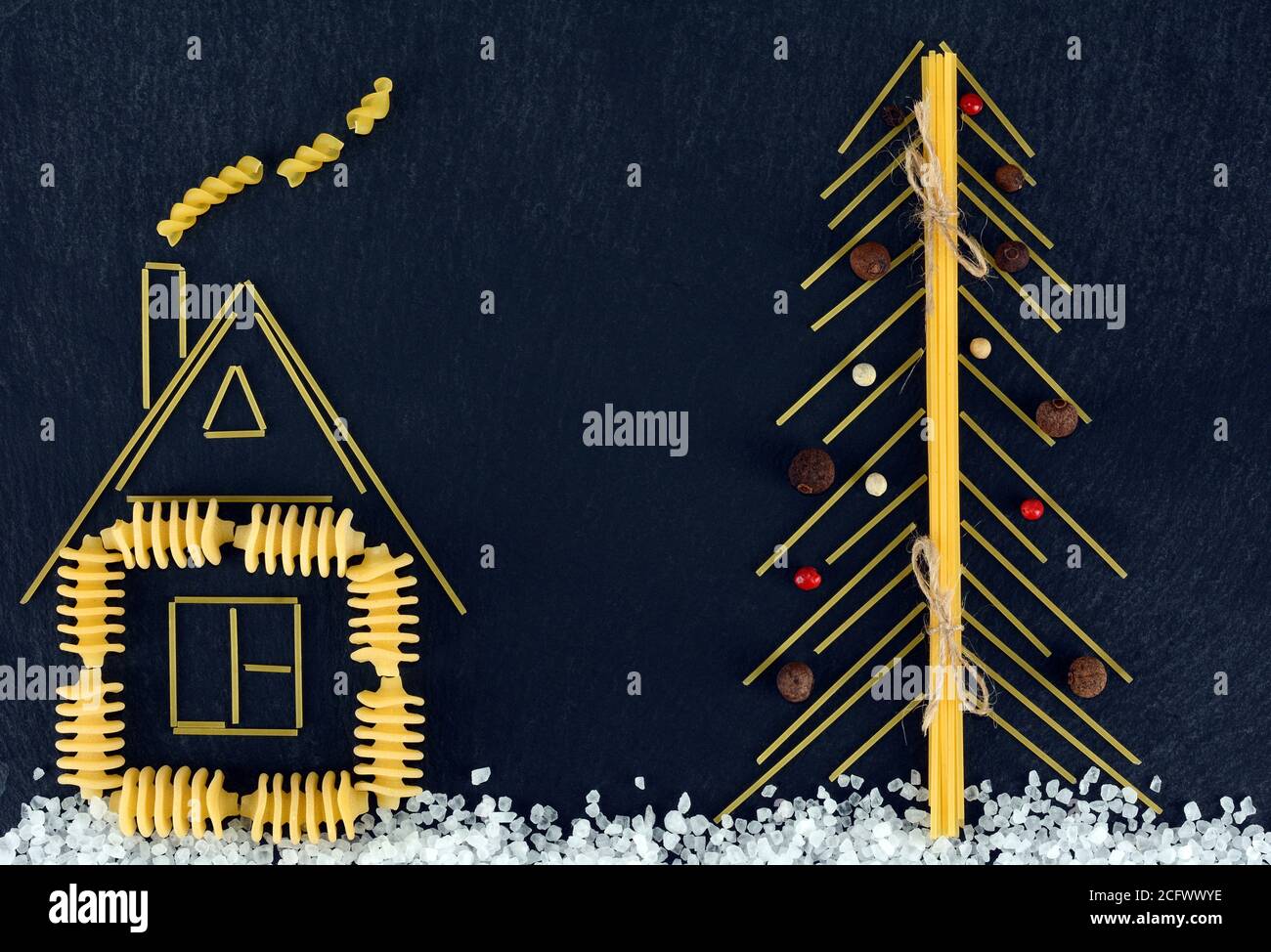 Christmas tree made with italian spaghetti with salt, pepper, on a ...