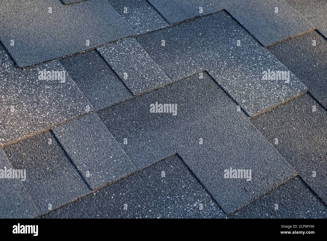 Close up view on asphalt roofing shingles Stock Photo - Alamy