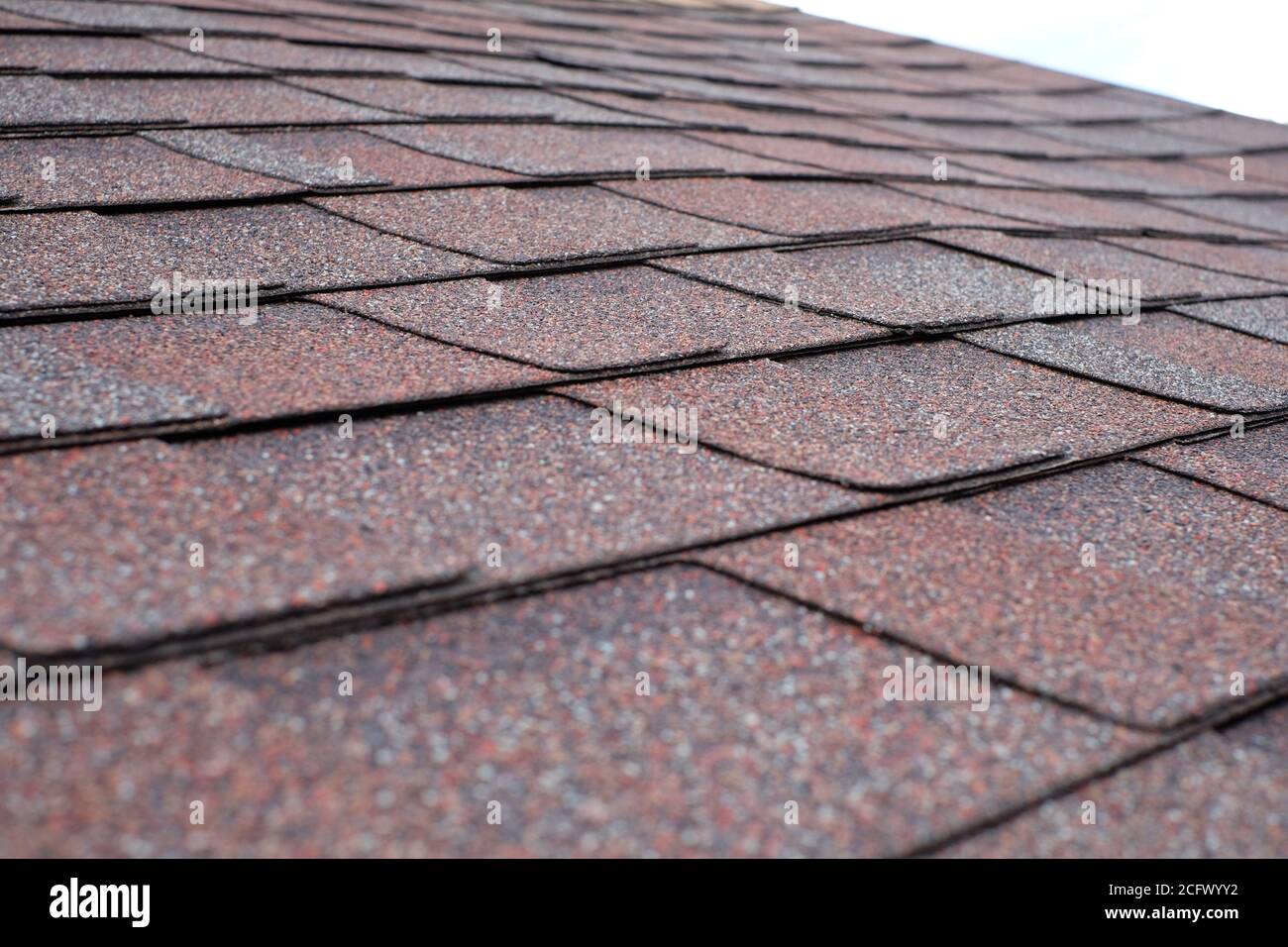 Close up view on asphalt roofing shingles Stock Photo - Alamy