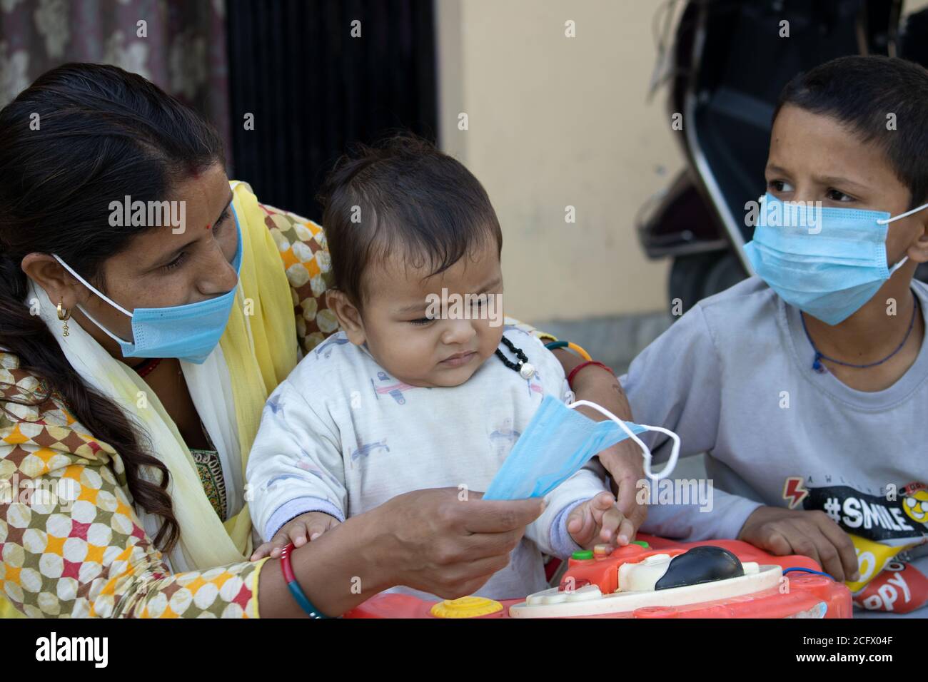 Dehradun, Uttarakhand/India - September 06 2020 : Indian mother is ...