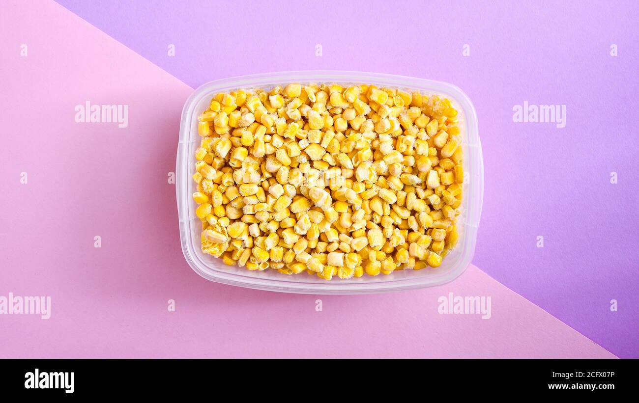 Corn in a plastic container for long-term storage. Deep freezing of ...