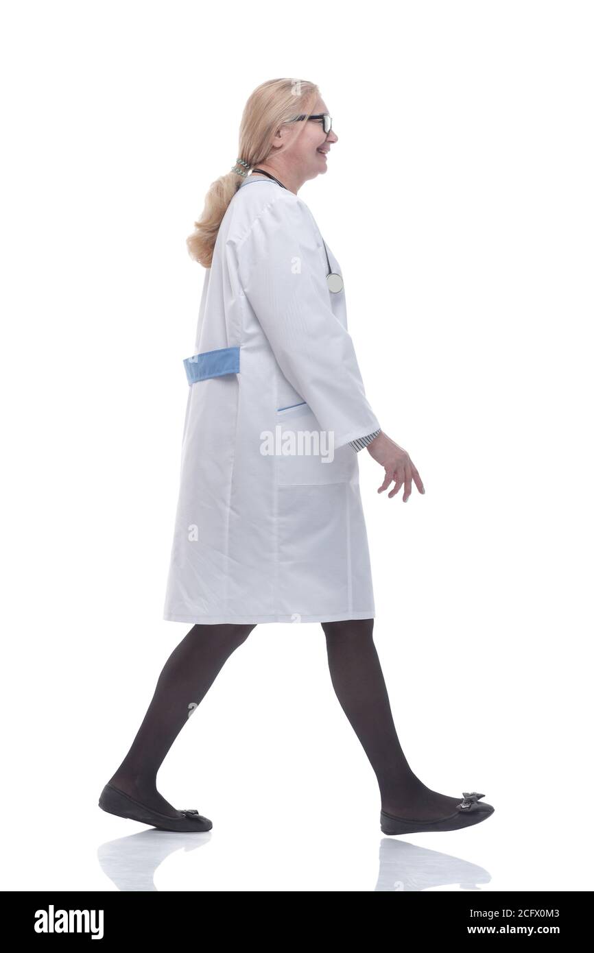 side view. experienced female doctor stepping forward Stock Photo - Alamy