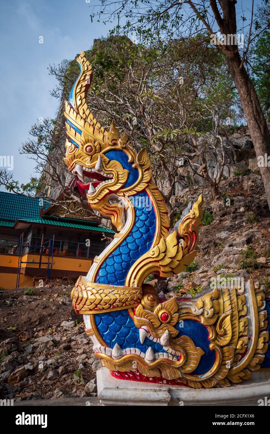 Beautiful serpent sculpture cement art with colorful Stock Photo - Alamy
