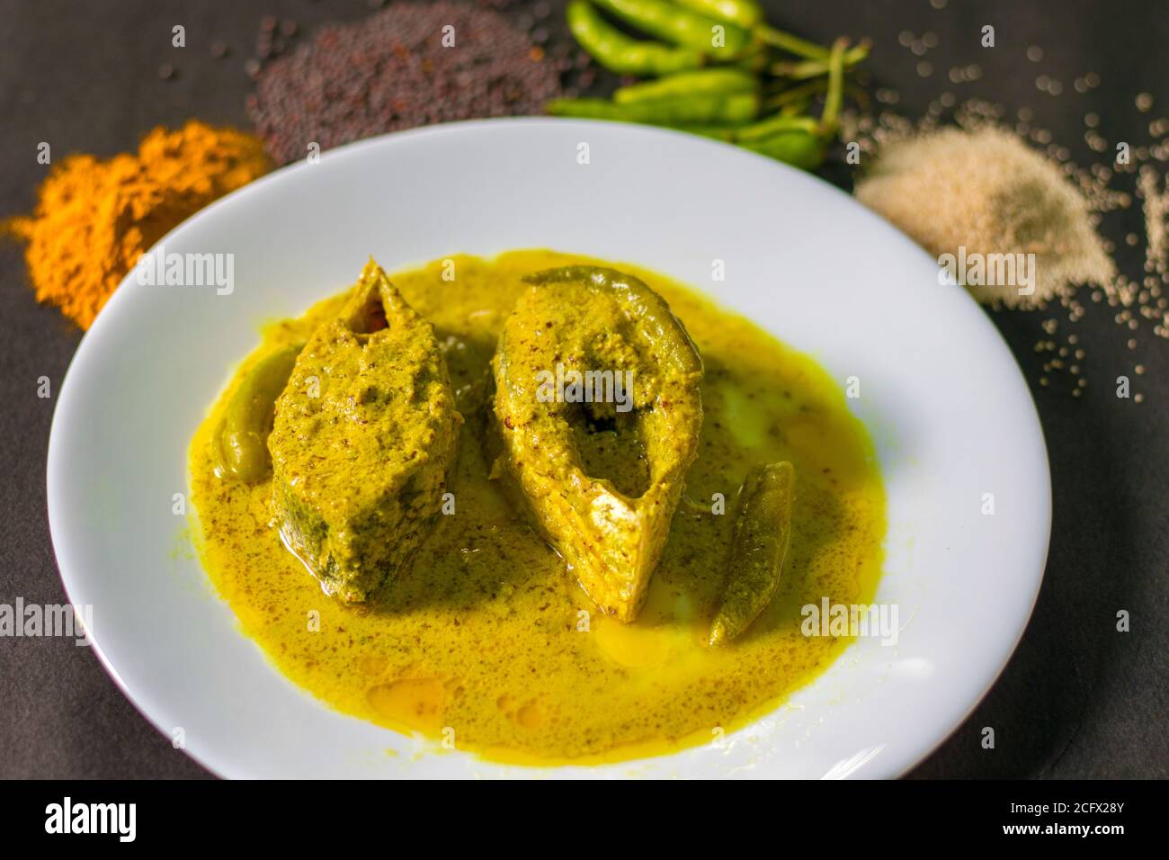 Famous Bengali Dish Hilsa/Ilish fish with poppy and mustard seed recipe ...