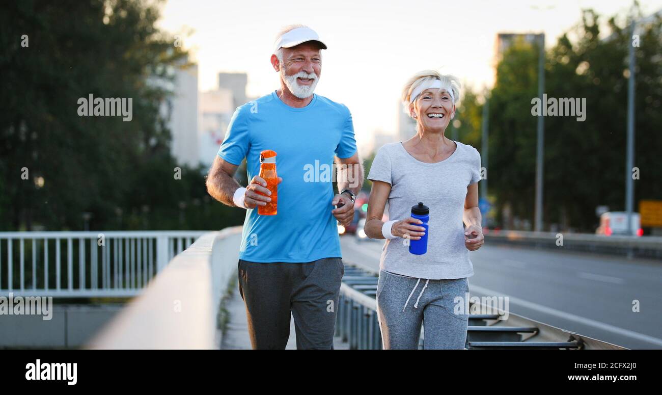 Elderly men jogging hi-res stock photography and images - Alamy