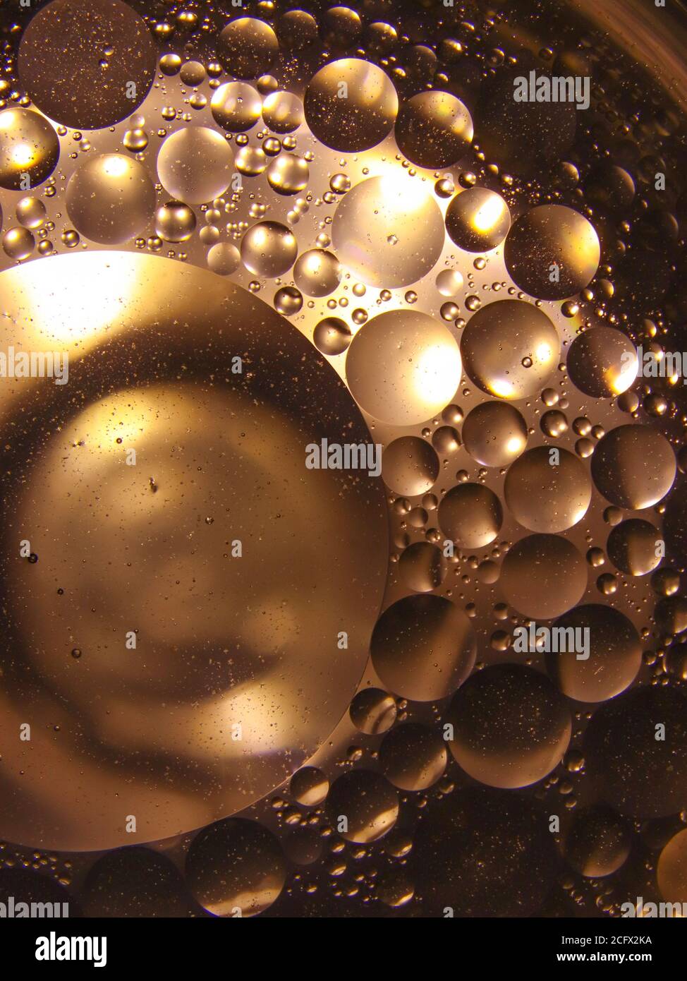 Abstract colorful oil drop on water macro photography Stock Photo - Alamy