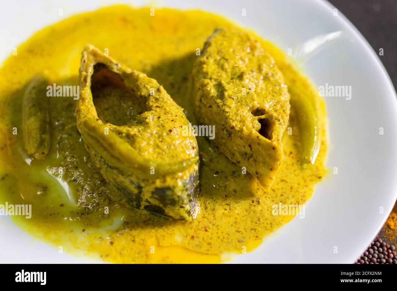 Famous Bengali Dish Hilsa/Ilish fish with poppy and mustard seed recipe ...