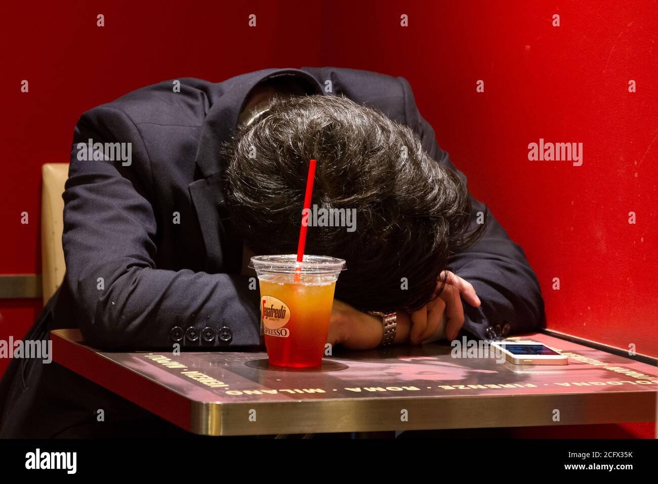 Exhausted salaryman hi-res stock photography and images - Alamy