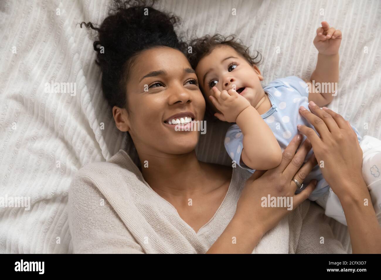 African mother and baby daycare hi-res stock photography and images - Alamy