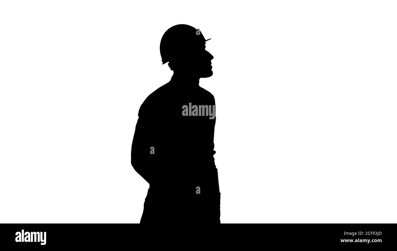Silhouette Science engineer walking in helmet. Safety concept Stock ...