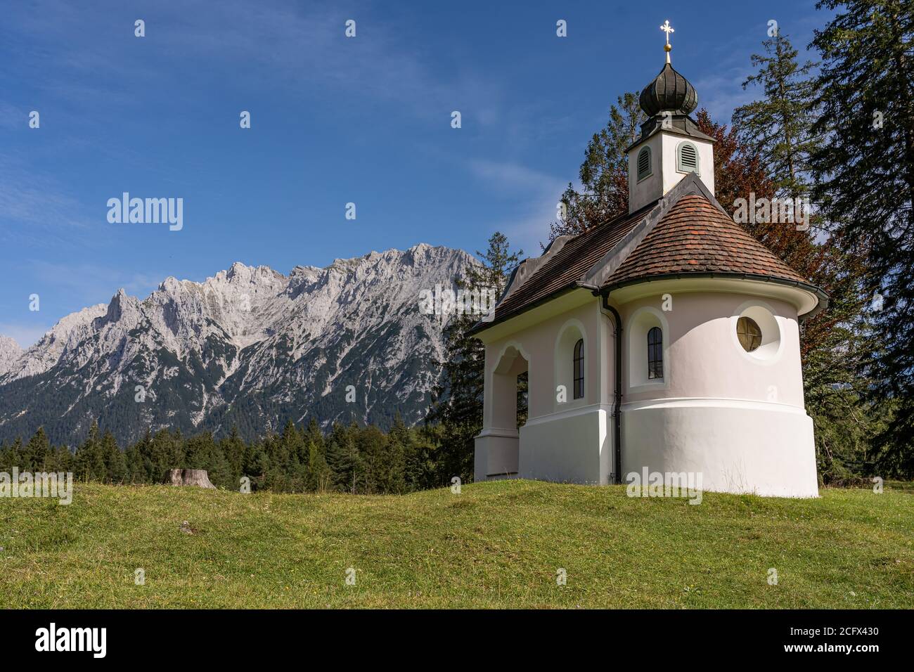 view on karwendel mountains and the chapel maria koenigin (queen maria ...