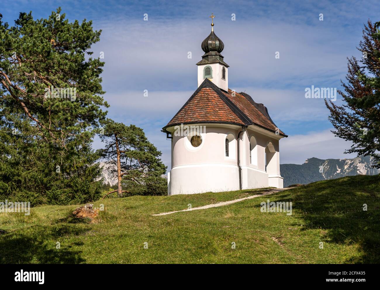 view on karwendel mountains and the chapel maria koenigin (queen maria ...
