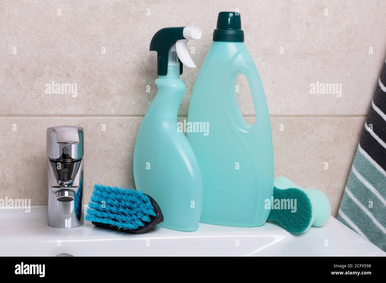 Cleaning equipment on bathroom sink Stock Photo - Alamy