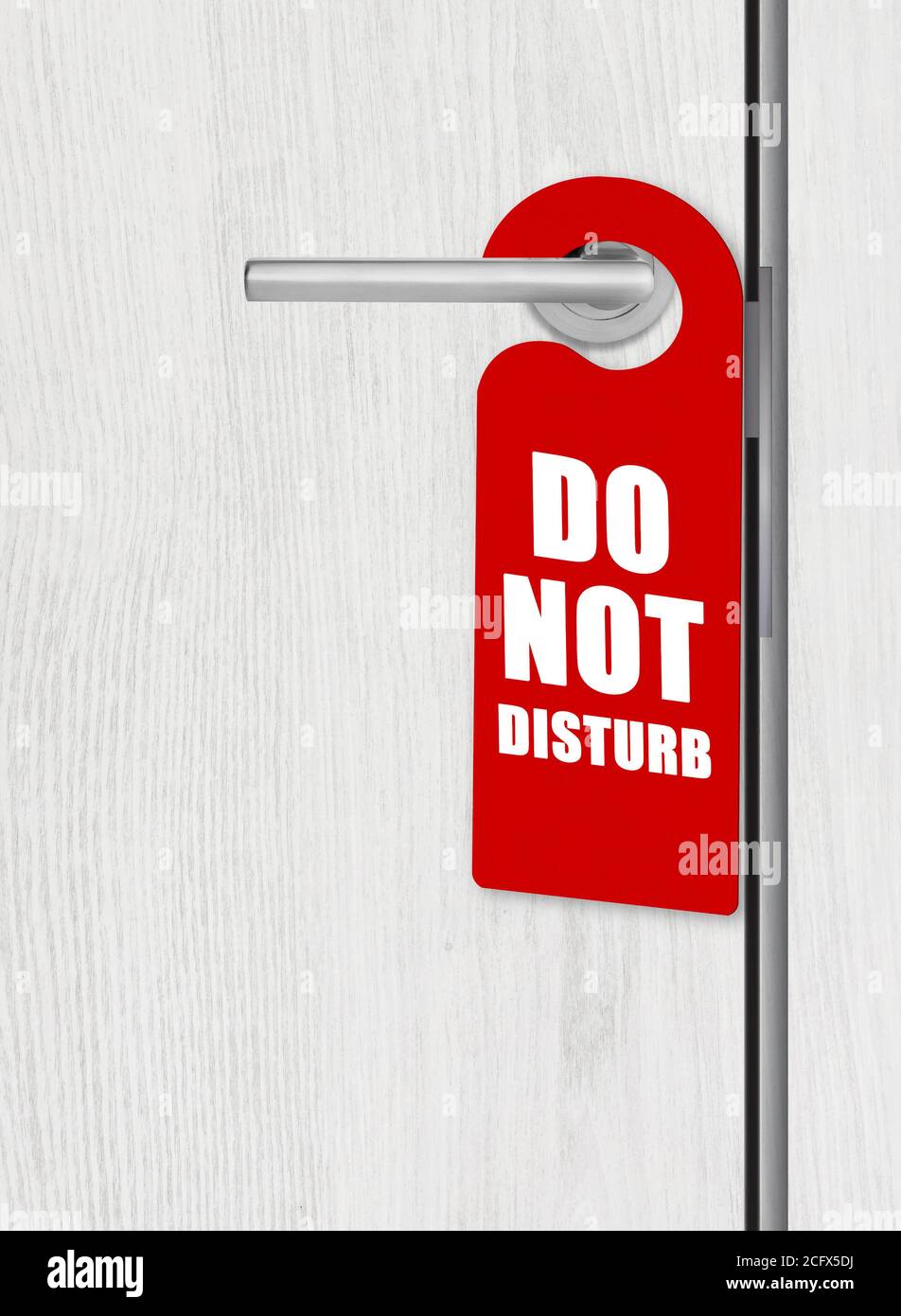 Do not disturb sign on door handle Stock Photo - Alamy