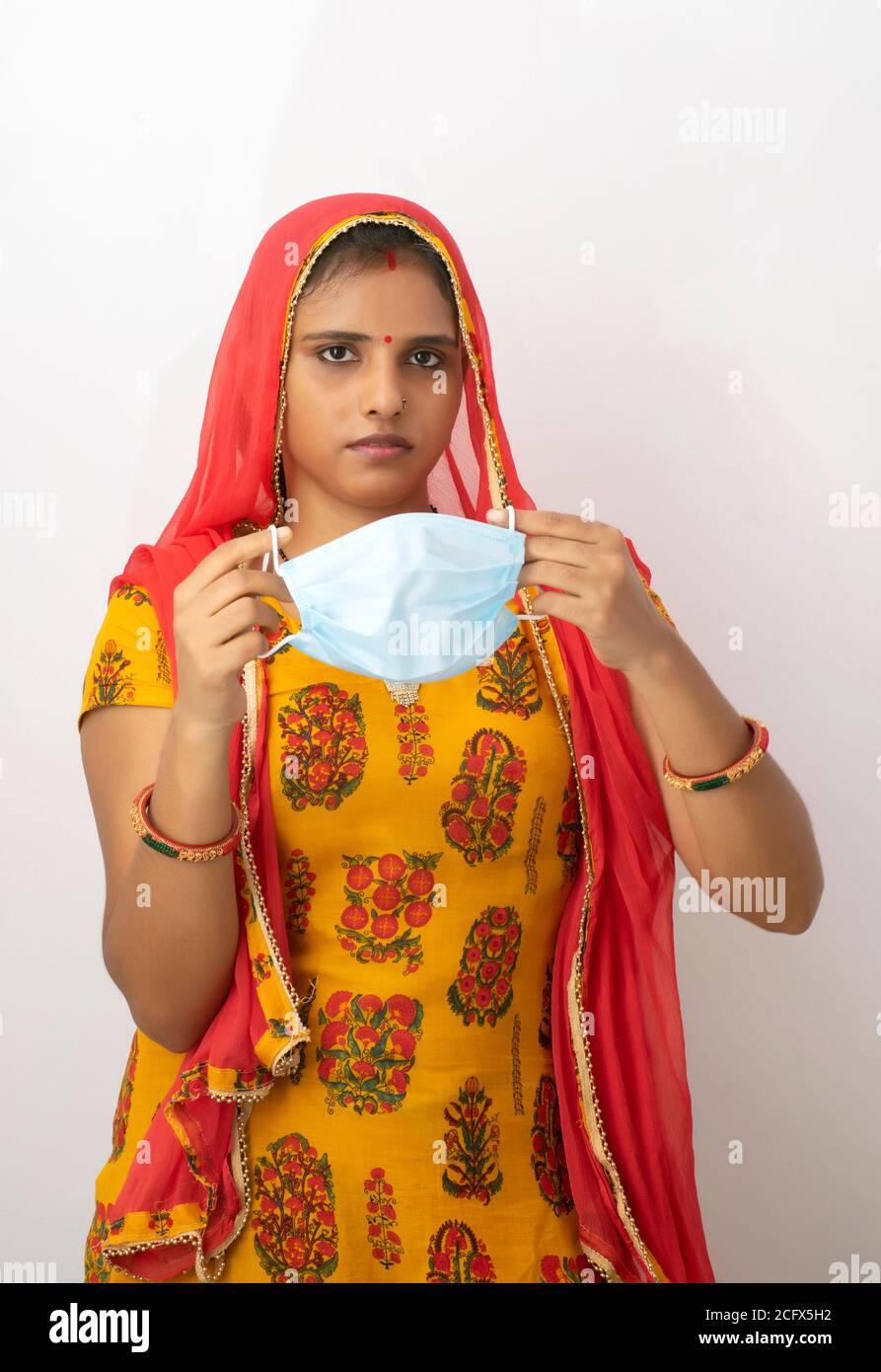 Indian woman wearing mask Stock Photo - Alamy