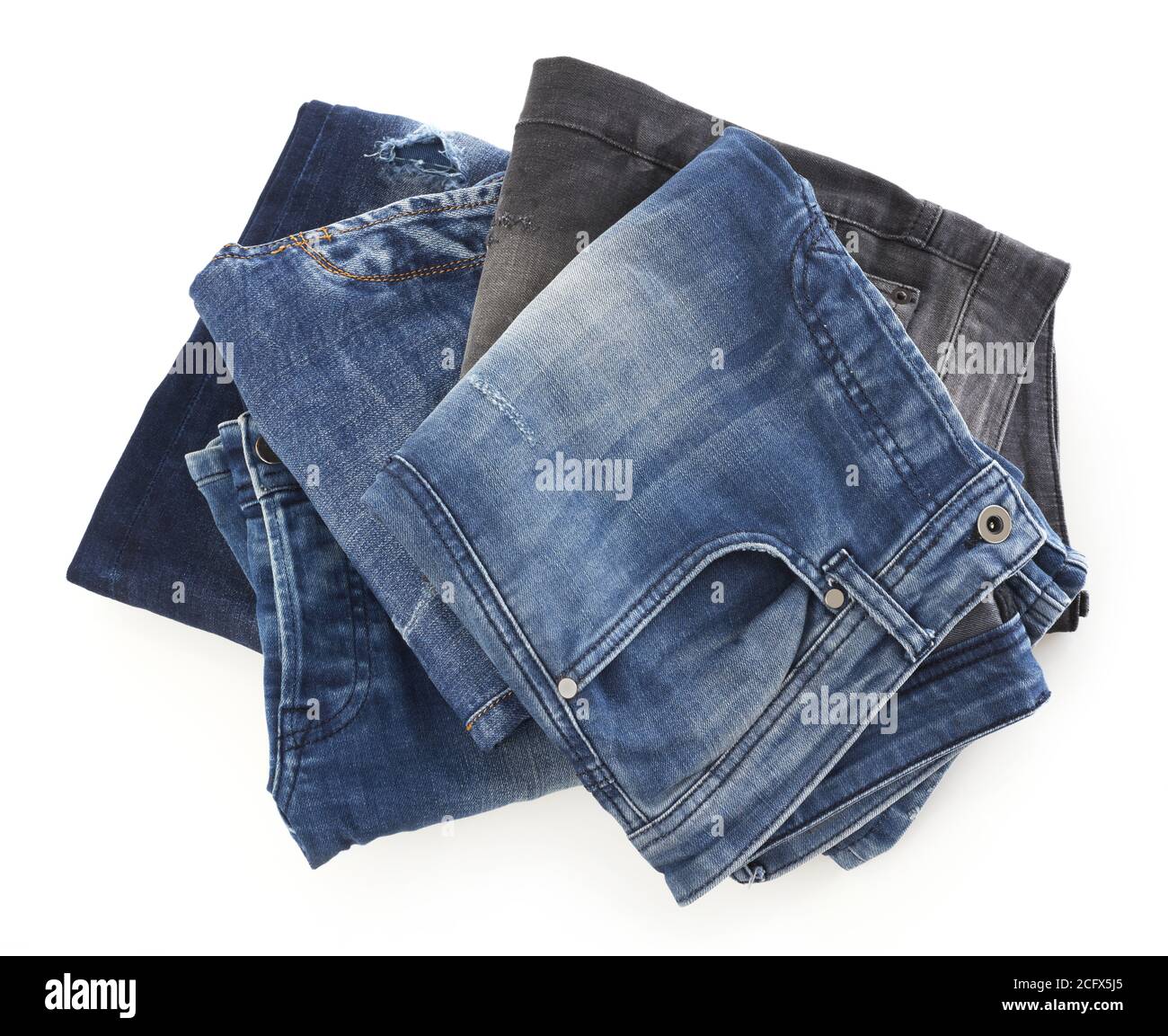 Stack of jeans isolated on white Stock Photo - Alamy