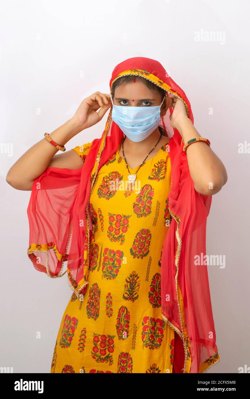 Indian woman wearing mask Stock Photo - Alamy
