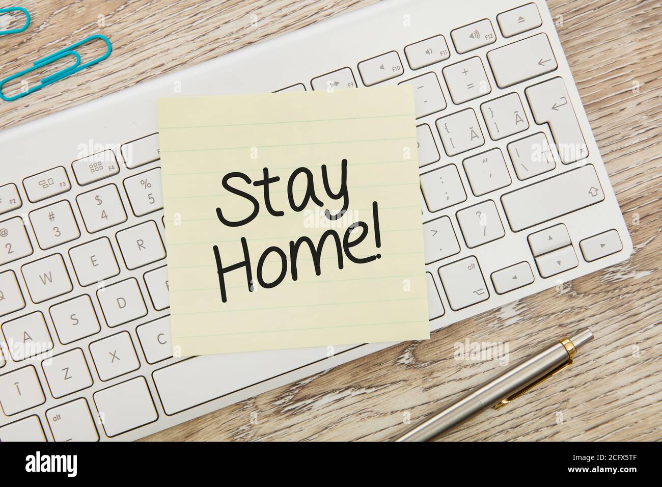 Stay home message on post-it Stock Photo - Alamy