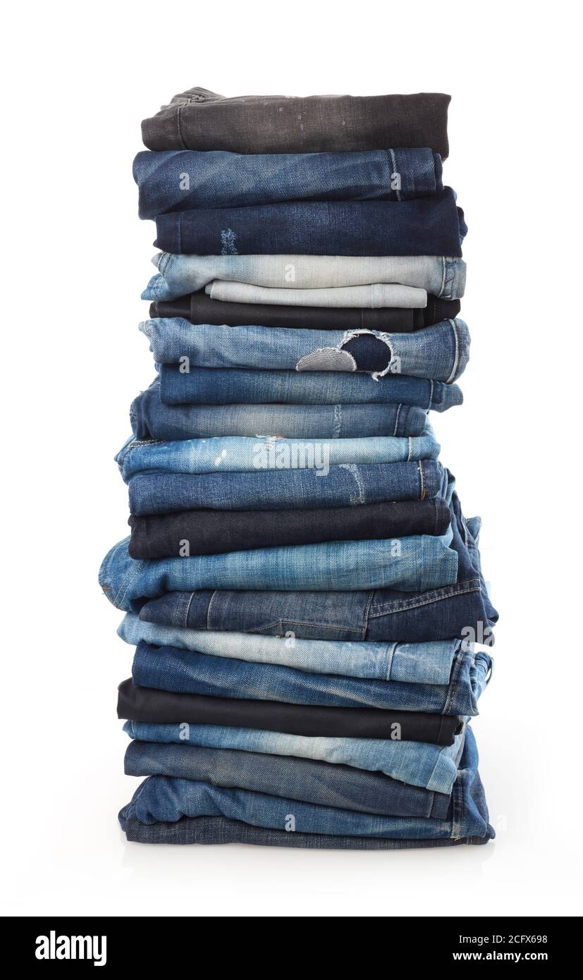 Stack of jeans isolated on white Stock Photo - Alamy