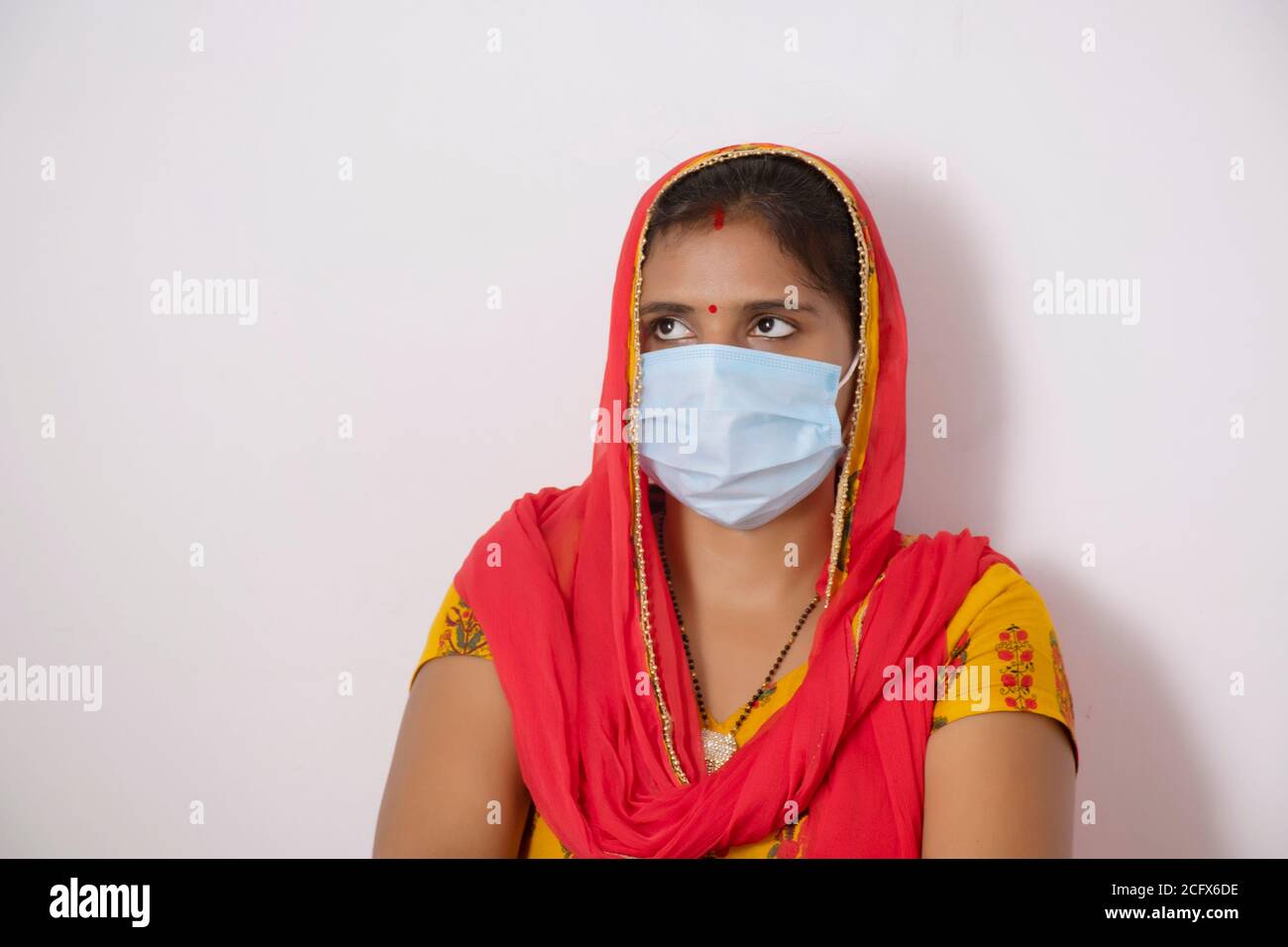Indian woman wearing mask Stock Photo - Alamy