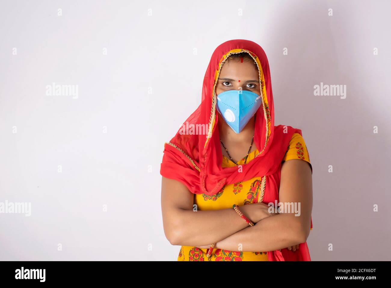 Indian woman wearing mask Stock Photo - Alamy