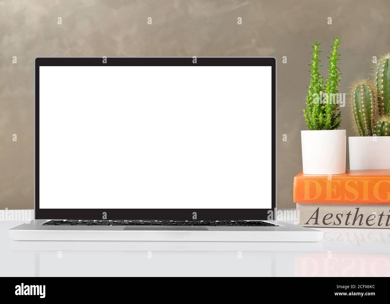 Laptop with blank screen on desk Stock Photo - Alamy